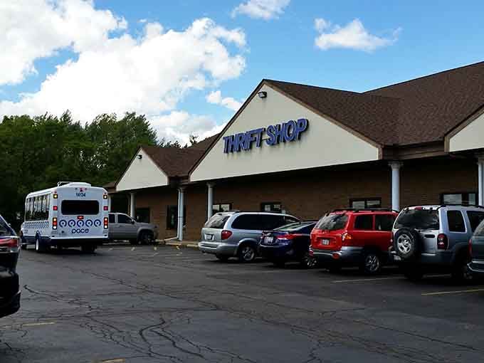 Spring trees frame this welcoming building where shoppers return weekly to discover what new treasures have arrived since yesterday.