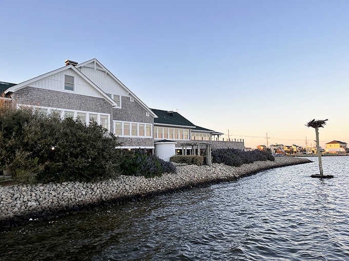 Golden light kisses the weathered shingles as another perfect evening unfolds at this beloved waterfront dining destination.