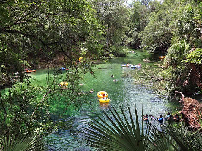 Emerald-green spring water draws tubers and swimmers like a magnet on hot summer days in central Florida.