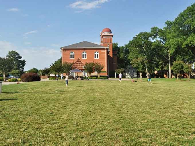 That brick tower rises above sprawling lawns where students gather, study, and make lifelong memories together.