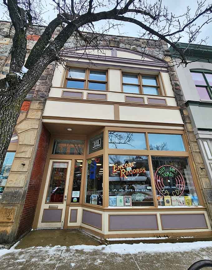 The historic building's character perfectly complements the timeless appeal of vinyl records waiting inside those doors.