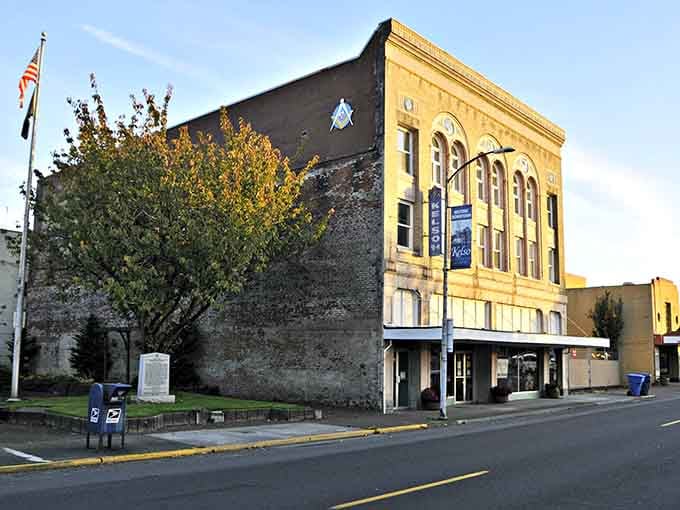 Historic theater facades stand dignified beside newer neighbors, creating architectural harmony that feels just right for this community.