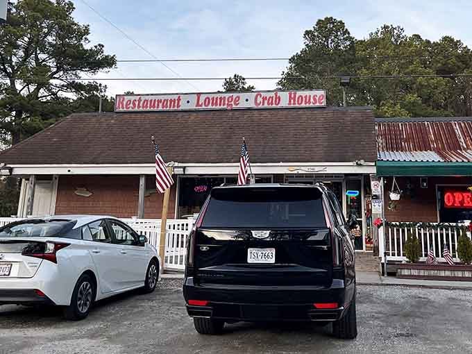 Patriotic flags wave proudly above this authentic crab house, where getting messy is practically a requirement for entry.