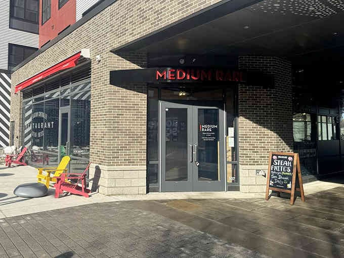 Medium Rare's bold red signage announces their focused mission: perfect steaks without the pretentious steakhouse attitude.