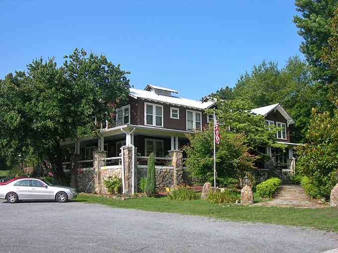 Classic mountain architecture with stone pillars that have welcomed weary travelers for generations.