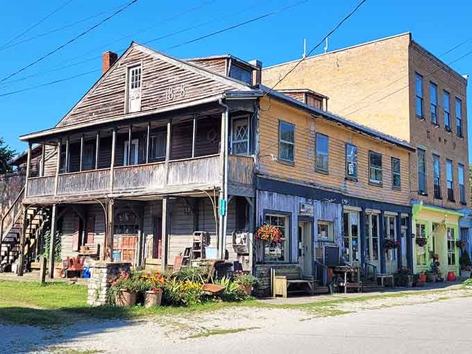 These weathered buildings wear their age like badges of honor, each plank telling tales of bygone days.