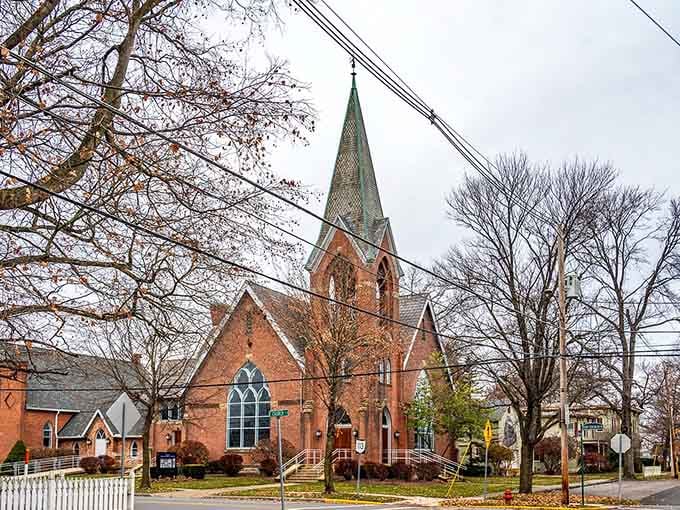 A beautiful brick church spire reaches skyward, anchoring the community with timeless architecture that's witnessed countless weddings and Sunday services over the decades.
