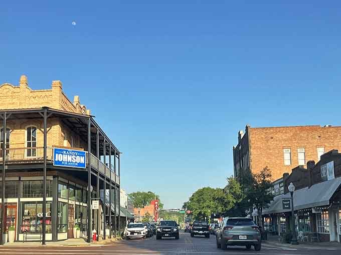 Golden hour bathes these historic storefronts in light that makes every building look like it's posing for postcards.
