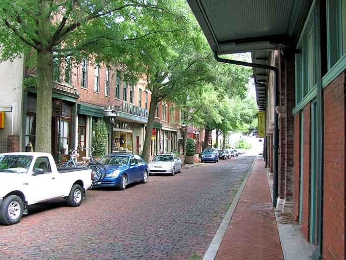 Tree-shaded sidewalks invite leisurely strolls where the journey matters more than checking off your to-do list.