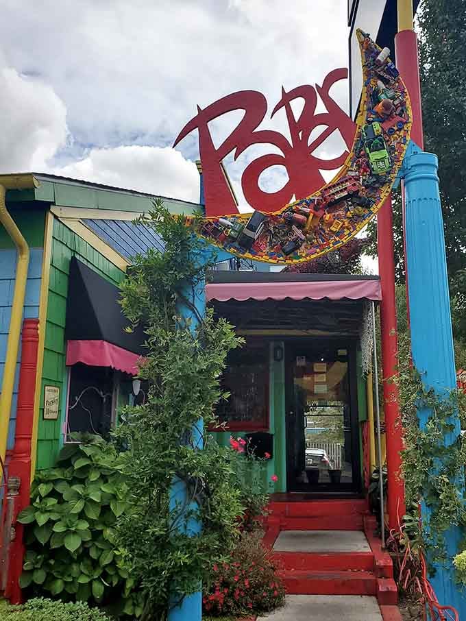 The playful sign adorned with toys hints at the wonderfully quirky experience awaiting hungry diners inside.