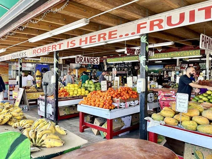 Robert's bold sign and overflowing fruit displays create a sensory explosion that's been delighting visitors for generations of families.