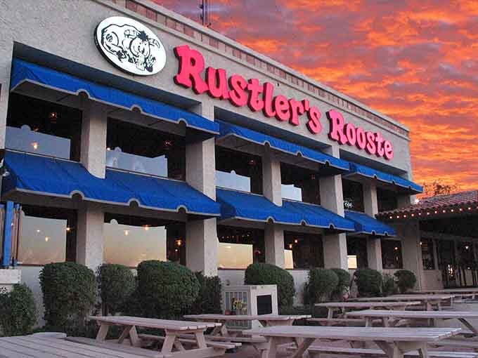 Mother Nature painted the perfect backdrop for this casual steakhouse as the desert sky blazes orange.