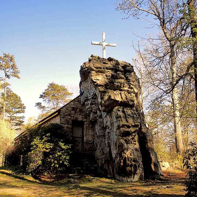 That white cross perched atop the boulder makes this one of the most photographed churches anywhere around.