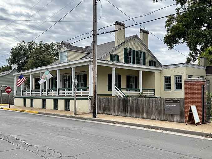 That wraparound porch on this French Colonial beauty practically demands a glass of lemonade and unhurried afternoon conversation with neighbors.