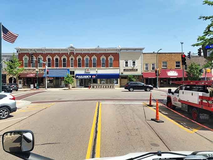 That classic main street view makes you want to park, stroll, and discover what treasures hide behind those storefront windows.