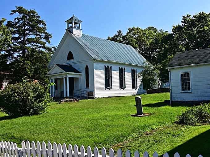 This pristine white chapel with its simple bell tower embodies the peaceful Shaker philosophy in architectural form.