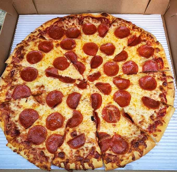 Pepperoni circles cover this pizza like polka dots on a delicious dress you'd actually want to eat.