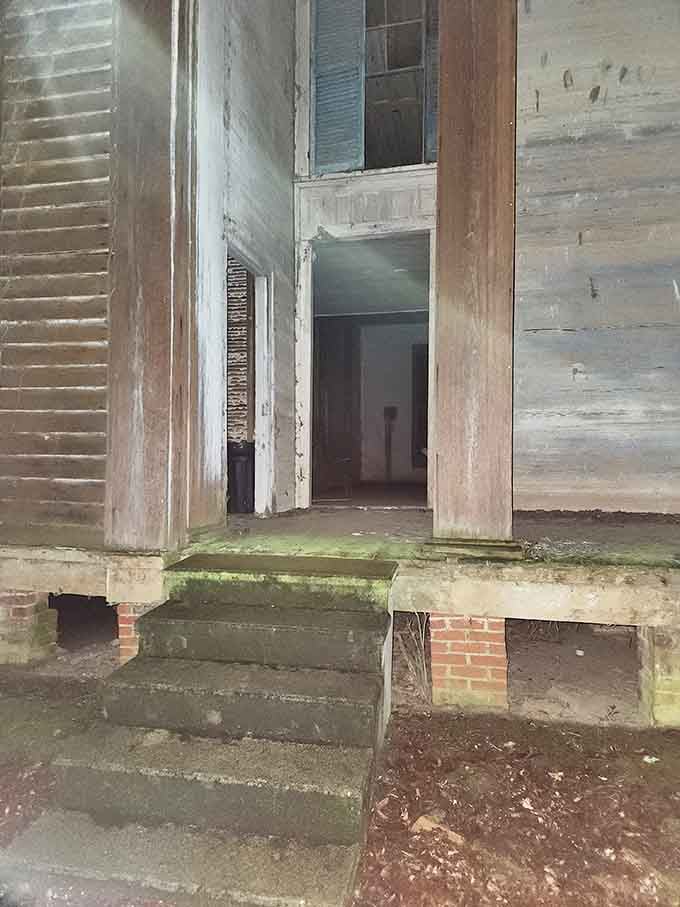 Weathered steps lead to doorways that once welcomed congregations now resting just beyond these walls.