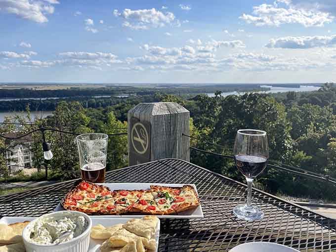 Pizza, wine, and a vista stretching to the horizon make ordinary meals feel like special occasions.