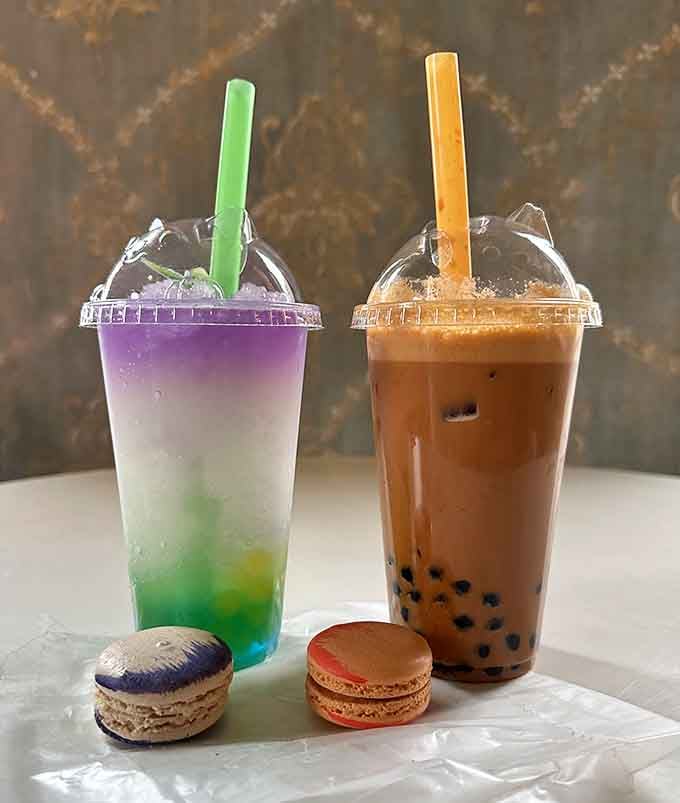 Macarons in every color paired with their respective layered drink, each pair an edible work of art.