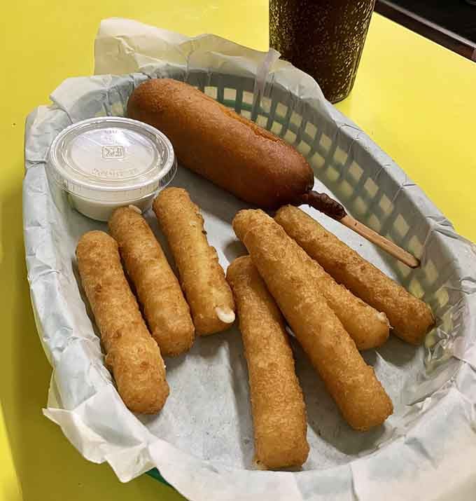 Golden mozzarella sticks and a corn dog prove that fried food is always a good life decision.