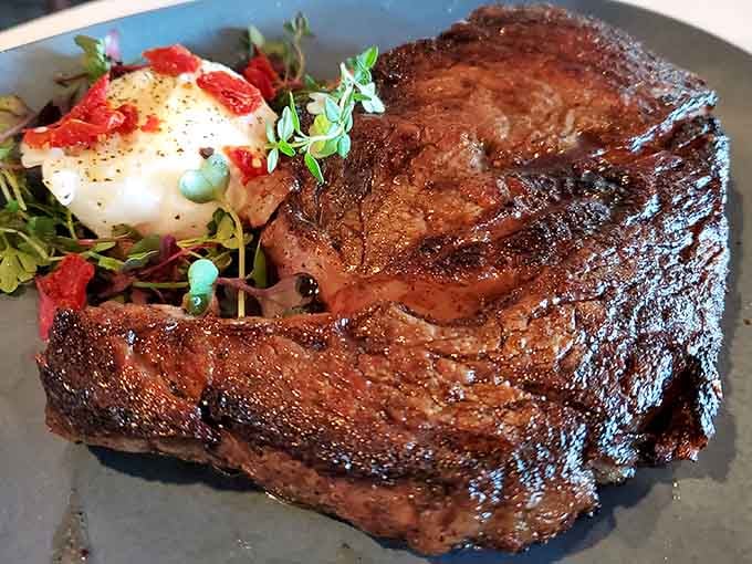 A ribeye so perfectly seared it deserves its own standing ovation and possibly a trophy.