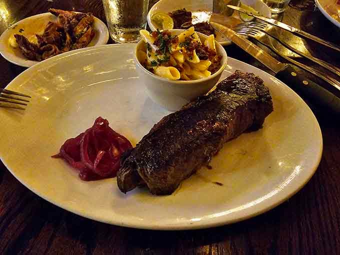 The KC strip showcases that beautiful char and juicy interior that separates amateurs from steak masters.