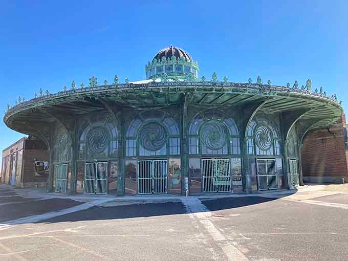 This Art Nouveau carousel pavilion looks like something from a dream where architecture dances with whimsy and copper turns green.