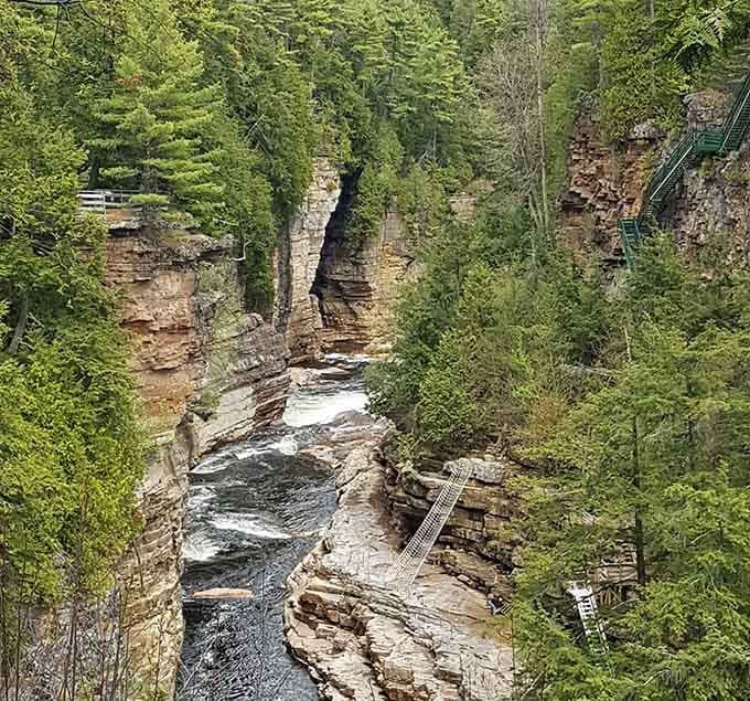 Aerial perspectives reveal the serpentine path carved by patient water, one grain of sandstone at a time over eons.