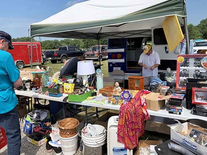 Outdoor vendors showcase eclectic treasures under canopies, from lamps to household goods, all waiting for new homes.