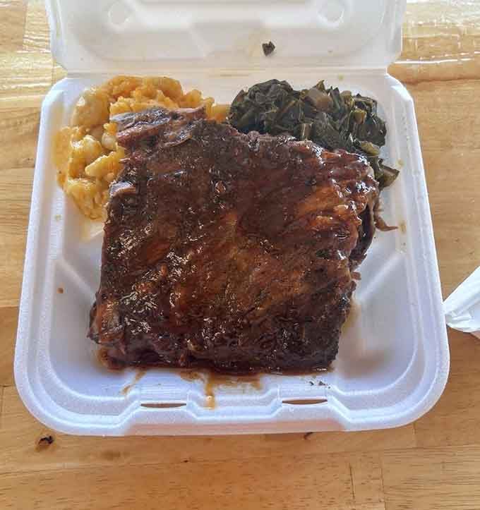 Ribs so good they deserve their own fan club, flanked by collards and mac that complete the trinity.