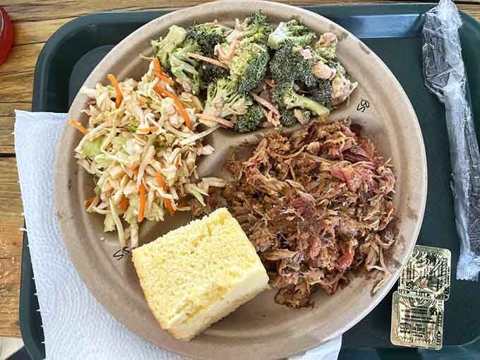 Pulled pork so tender it surrenders without a fight, plus cornbread and all the fixings you need.