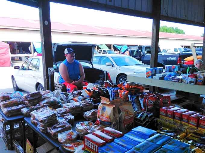 This vendor's spread includes everything from snacks to household goods, making practical shopping surprisingly entertaining and budget-friendly too.