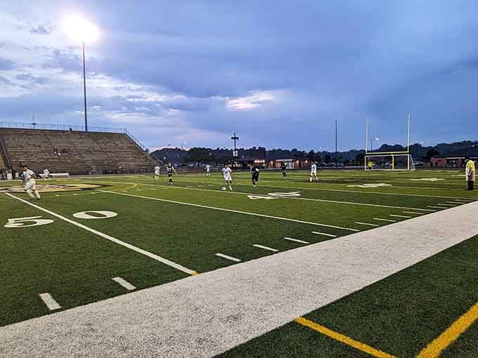 Friday night lights shine at McAlpine Stadium, where the whole town gathers and parking is actually free.