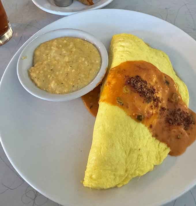 This omelet folds around its fillings like a warm, eggy hug you didn't know you needed.