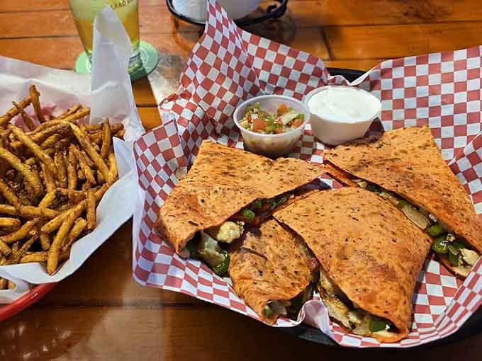 A quesadilla this generously stuffed paired with crispy fries is basically a hug on a plate.