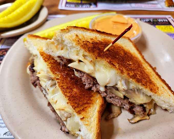 The patty melt: where beef, cheese, and grilled bread unite in holy matrimony on your plate.