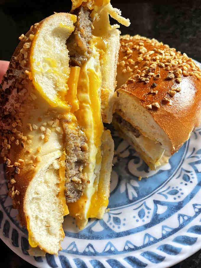 This is what breakfast dreams are made of: perfectly toasted bagel holding together pure morning happiness.
