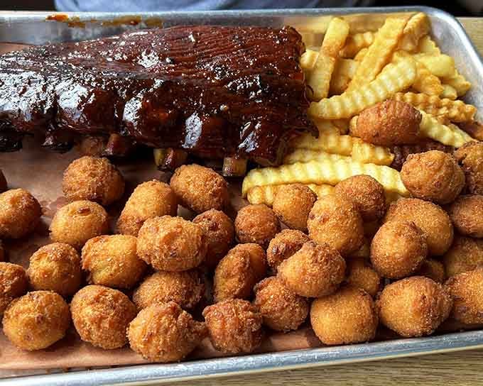 Rack of ribs so glossy and perfect they look like they're posing for their own cooking show audition.