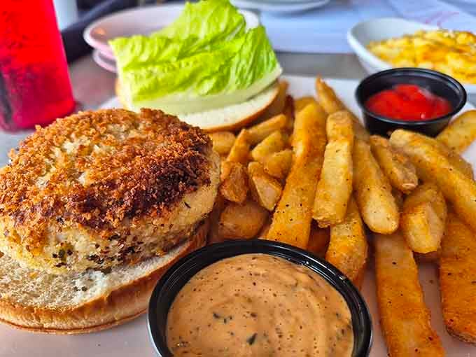 Golden-crusted crab cake sandwiches with crispy fries make lunchtime feel like a special occasion worth celebrating.
