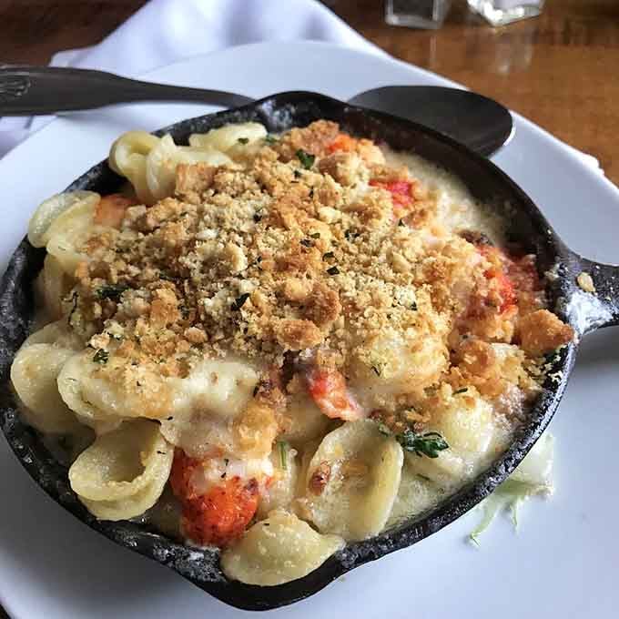 Lobster mac and cheese in a skillet: because sometimes you need comfort food wearing a tuxedo.