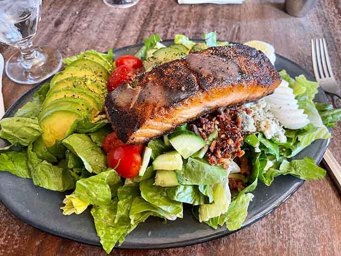 Perfectly seared salmon crowning a vibrant Cobb salad makes healthy eating look downright irresistible and Instagram-worthy too.