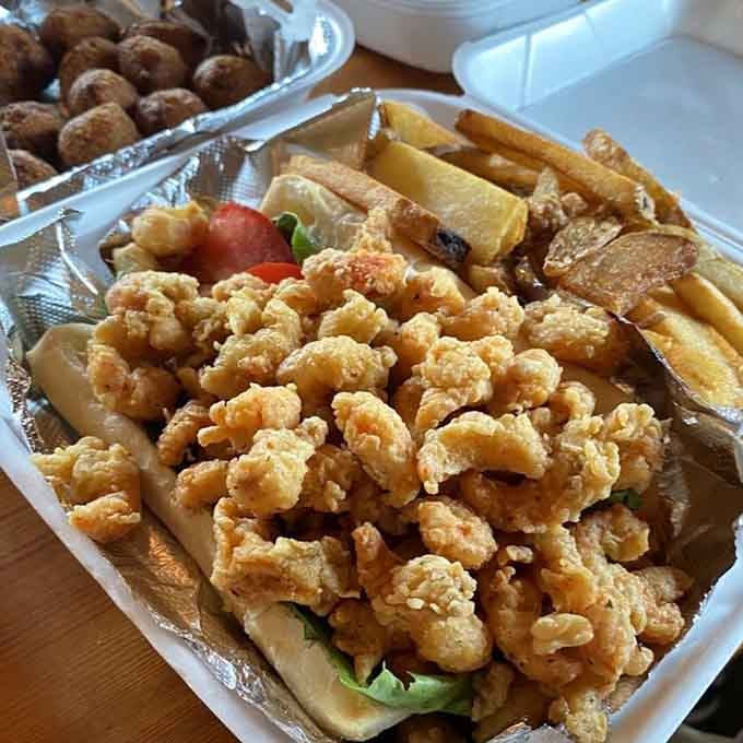 This Po' Boy sandwich is stuffed so generously, you'll need a strategy and possibly a bib to tackle it.