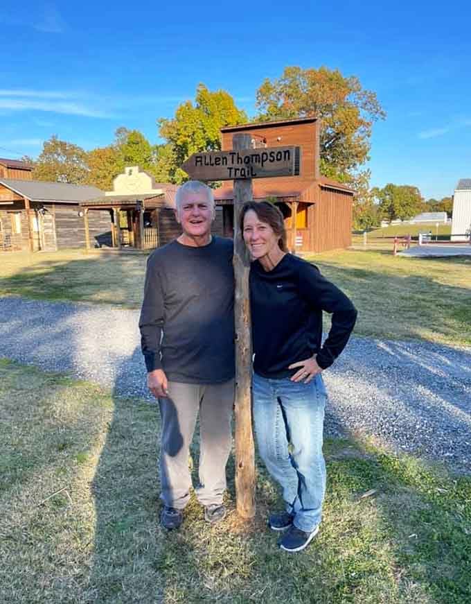 Standing by the trail marker, ready to write their own chapter in this Old West story.