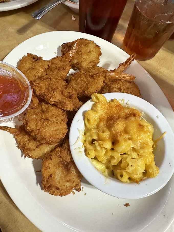 Coconut shrimp with mac and cheese proves that paradise exists on a single plate in Fort Lauderdale.