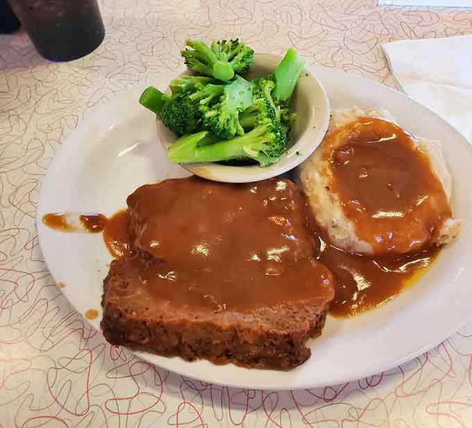 Meatloaf smothered in gravy with a side of bright green broccoli: your grandmother would approve wholeheartedly.