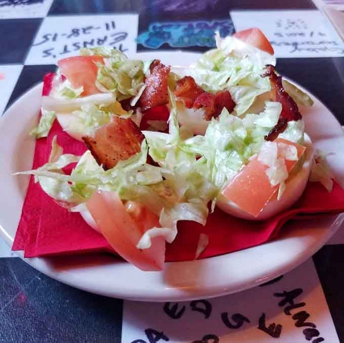 Fresh lettuce, ripe tomatoes, and crispy bacon create a colorful plate that's almost too pretty to devour. Almost.