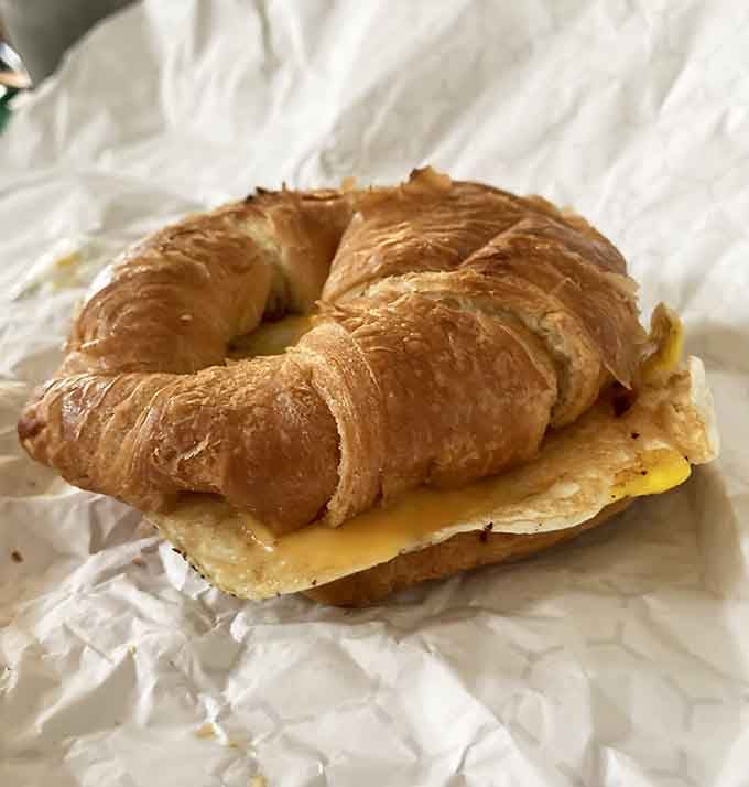 A flaky croissant breakfast sandwich that'll make you rethink everything you thought you knew about starting your day right.