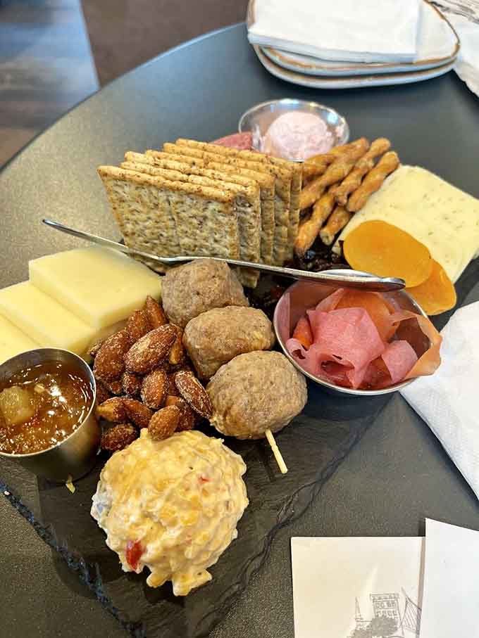 This snack platter understands that cheese, crackers, and candied nuts are the holy trinity of wine accompaniments everywhere.