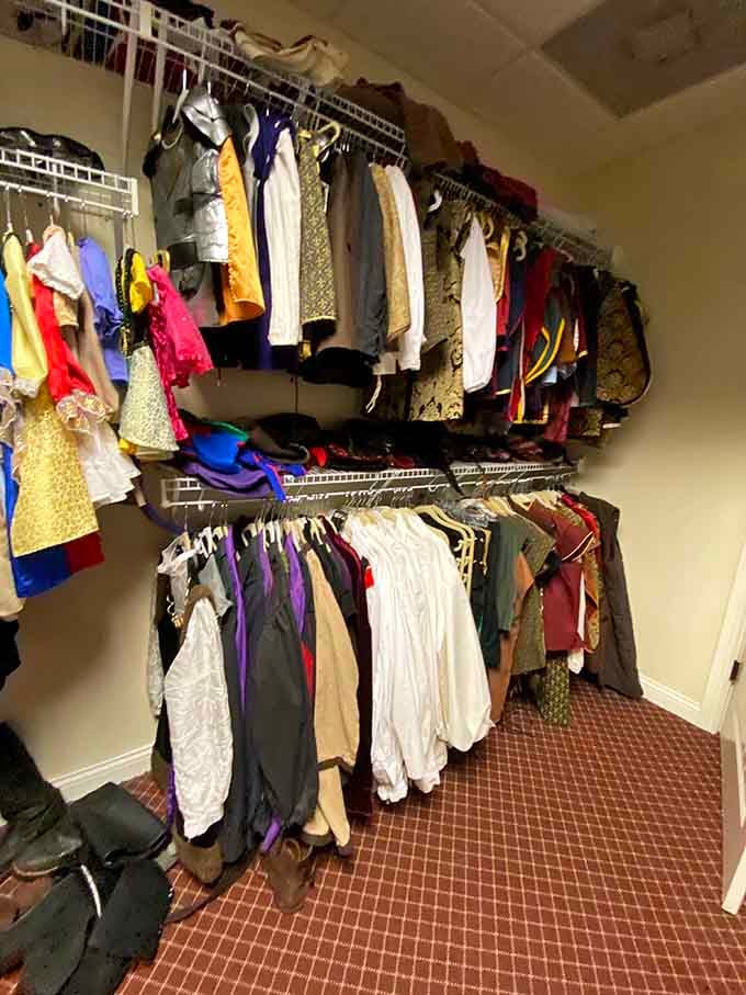 Medieval gowns and period costumes hang ready for guests who want the full storybook experience.